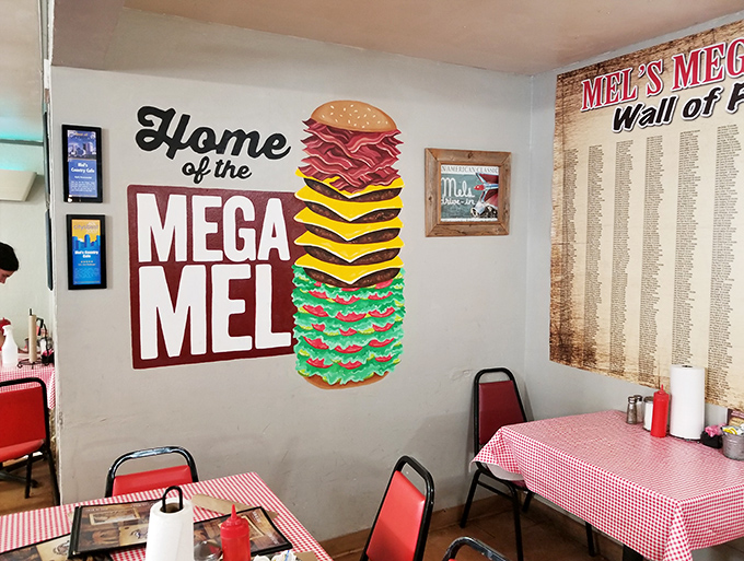 The "Home of the Mega Mel" wall art isn't just decoration&mdash;it's a warning of the delicious challenge that awaits the brave.