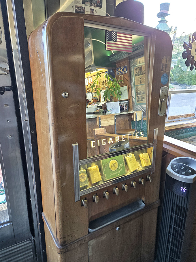 That vintage cigarette machine now serves as decor, a reminder of diners past when times were different.