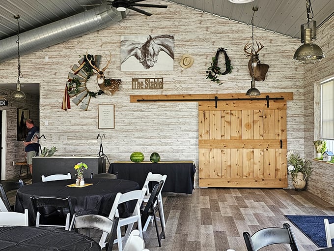 Rustic elegance with a side of whimsy. The barn door and stone walls tell you this place takes food seriously, but not itself.