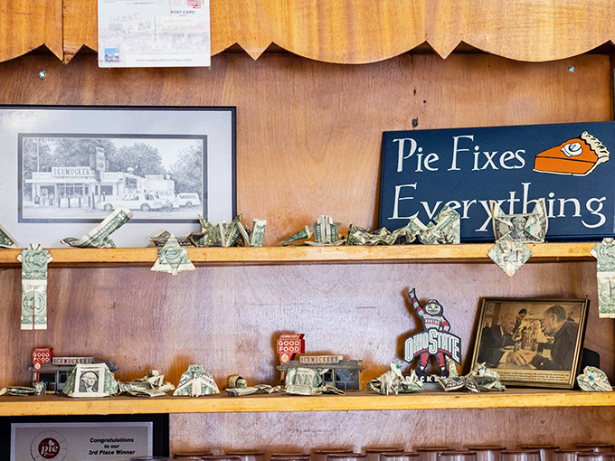 "Pie Fixes Everything" &ndash; the sign speaks truth while dollar bills and Ohio State memorabilia create a shrine to local pride.