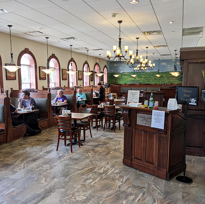 The main dining room balances casual comfort with touches of elegance&mdash;those arched windows letting in light that makes everyone look their best.