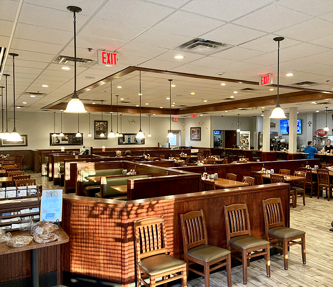 The dining room stretches invitingly with booths and tables arranged for both privacy and community &ndash; a masterclass in diner architecture.