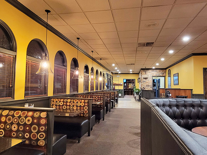 Booths designed for lingering conversations and serious eating. The kind of comfortable seating that whispers, "Order dessert, we've got time."