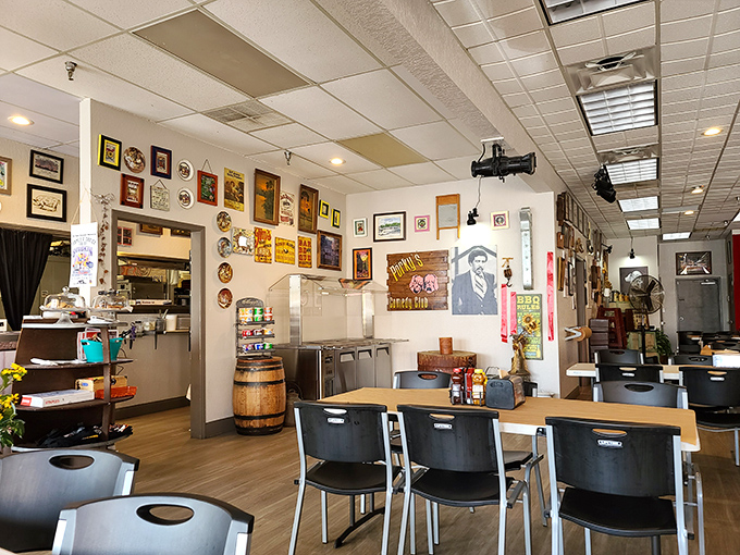 Walls adorned with BBQ memorabilia tell stories of smoke and fire. That wooden barrel isn't just decor&mdash;it's a symbol of craftsmanship.