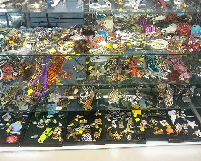 A treasure chest of costume jewelry where someone's past fashion statement becomes your future conversation piece. Beads, bangles, and bygone bling await new wrists and necks.