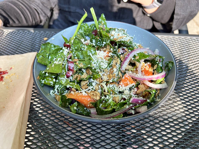 A kale salad that could convert even the most dedicated carnivore. Those vibrant greens and colorful additions making "eating healthy" feel like cheating somehow.