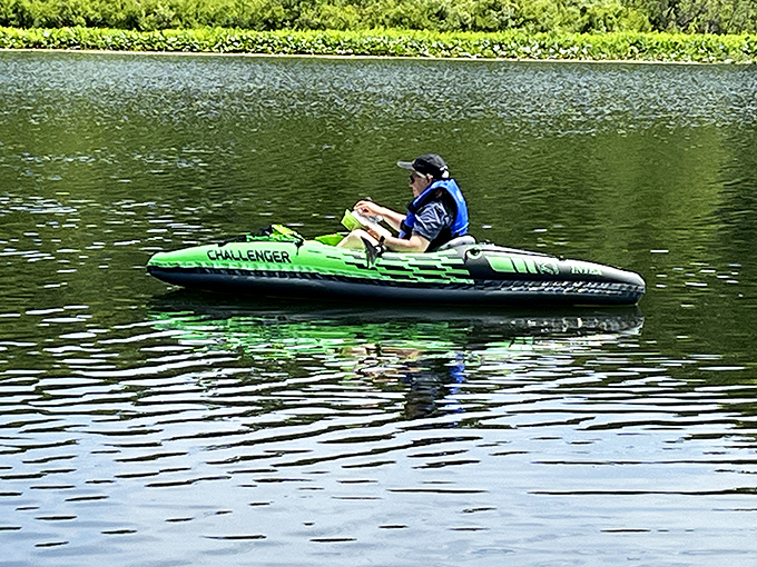 Solo kayaking on glass-like waters &ndash; sometimes the best company is the gentle splash of your paddle and your own thoughts.