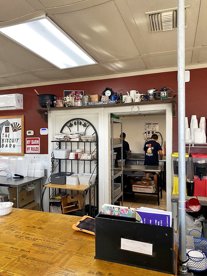 A glimpse into the kitchen where biscuit wizardry occurs. "My Barn, My Rules" sign suggests they know exactly what they're doing.