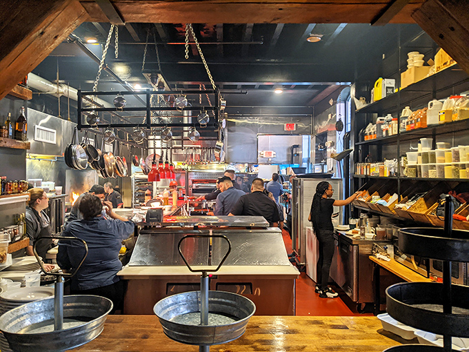 Three Oak's open kitchen operates like a culinary theater where chefs perform their delicious magic show nightly.