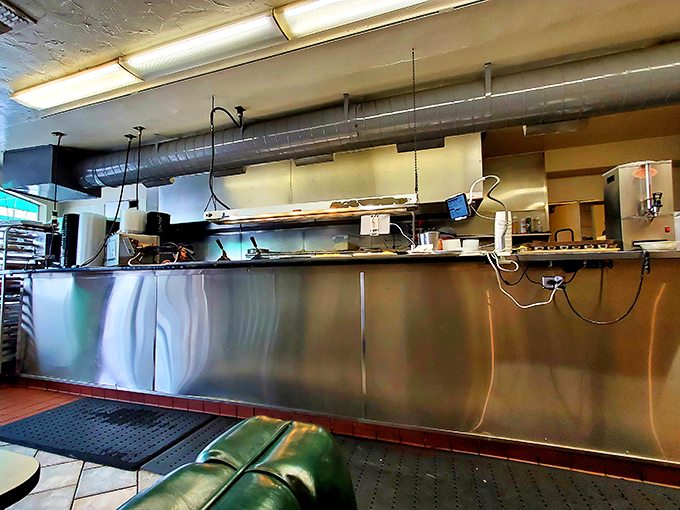 The kitchen pass &ndash; that magical portal where orders go in and comfort comes out, stainless steel gleaming with promise.