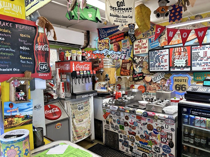 Organized chaos is an art form in this kitchen. Decades of burger-flipping wisdom packed into a space where nostalgia meets necessity.
