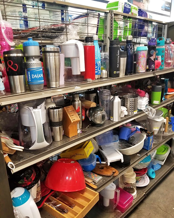 Kitchen gadget nirvana where coffee makers, blenders and water bottles gather like a support group for items seeking their second kitchen adventure.