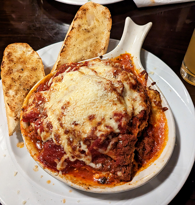 Hearty lasagna layers showcase kitchen versatility, proving this establishment excels beyond their famous seafood specialties with equal dedication.