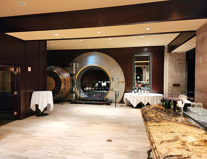 The vault entrance creates the perfect dramatic reveal for your dining experience. Like walking through a time portal where money worries transform into food fantasies.