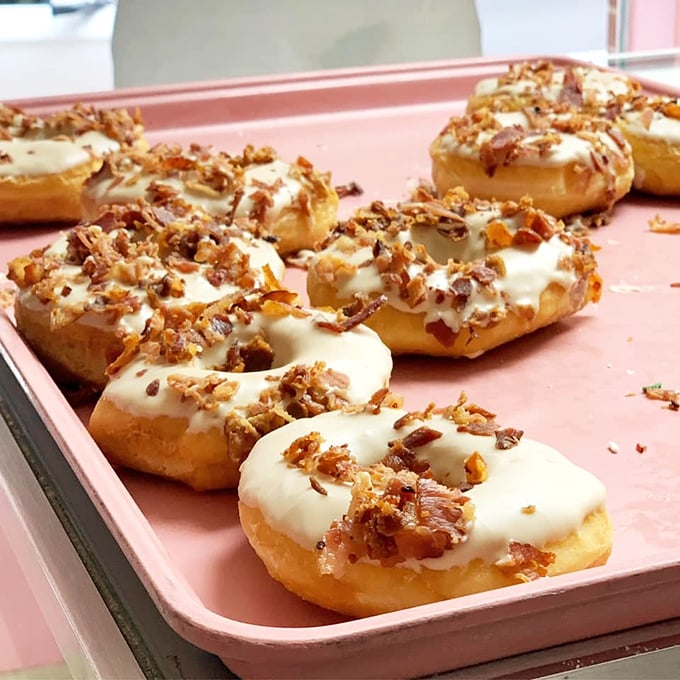 Maple meets bacon in a sweet-savory romance. These donuts prove that breakfast foods falling in love can create the most beautiful relationships.
