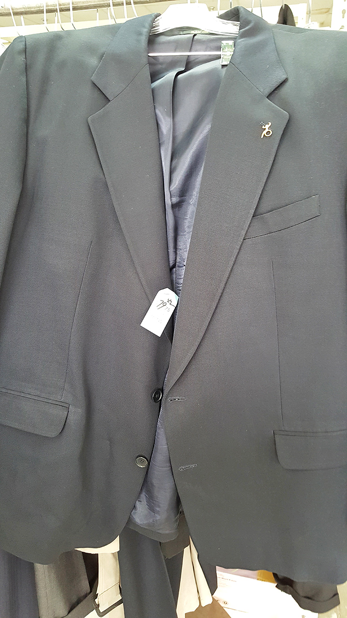 A gently-used suit jacket waiting for its next big interview or fancy dinner. Professional polish without the professional price tag.