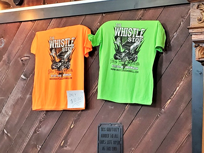 Whistle Stop merch—because sometimes you need a neon t-shirt to prove you've discovered one of Ohio's hidden culinary treasures.