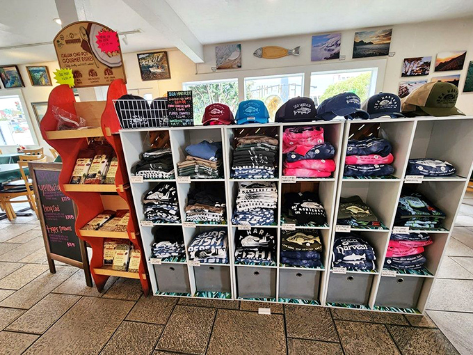 Merchandise that lets you take home more than just leftovers. These shirts and hats aren't just souvenirs&mdash;they're membership cards to the "I know where the locals eat" club. 