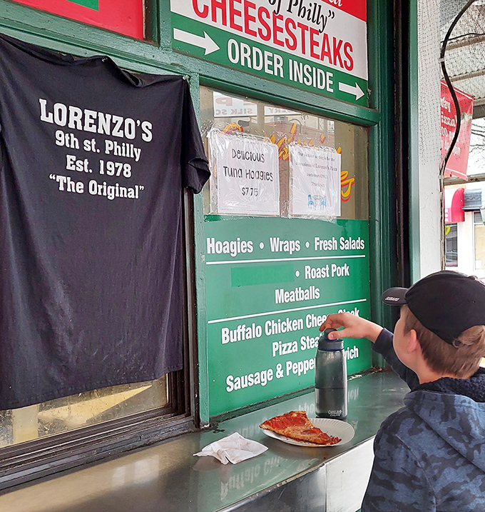 Even neighboring establishments acknowledge George's legendary status. In Philly's sandwich hierarchy, respect is earned one bite at a time.