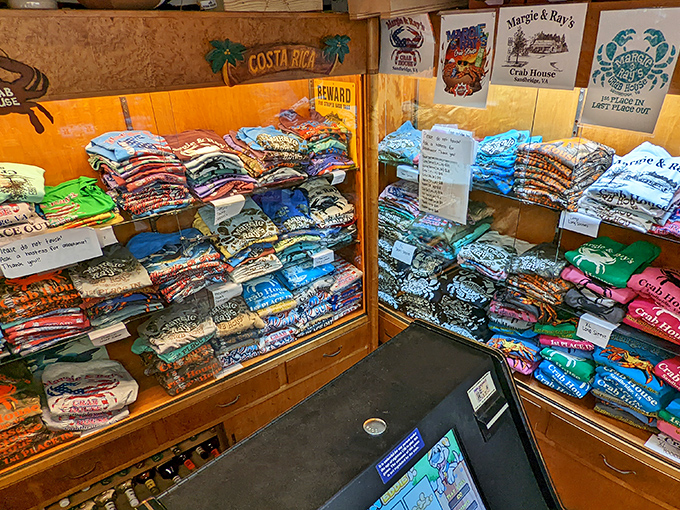 The merch corner &ndash; because nothing says "I conquered the crab legs" like a t-shirt to commemorate your victory over crustaceans.