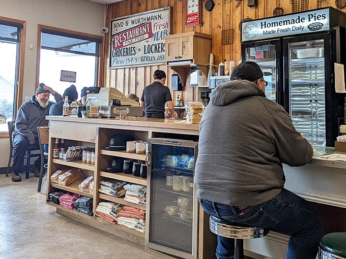 Where the pie case is the real local celebrity. That "Homemade Pies" sign isn't just information&mdash;it's a promise.