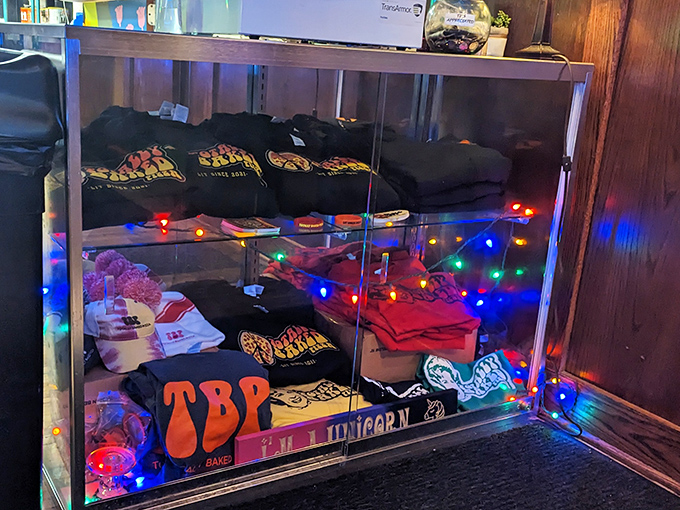 Merch that lets you take the vibe home when your stomach is full but your soul still wants to hang out. Those string lights are a nice touch.