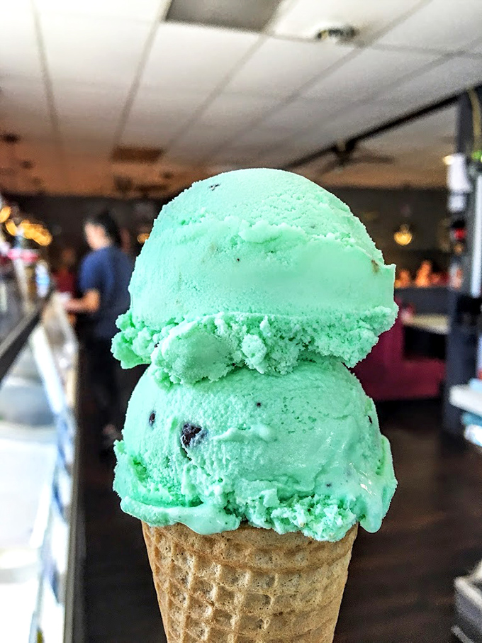 Mint ice cream stacked high like a green tower of joy. Two scoops is the minimum acceptable order here.