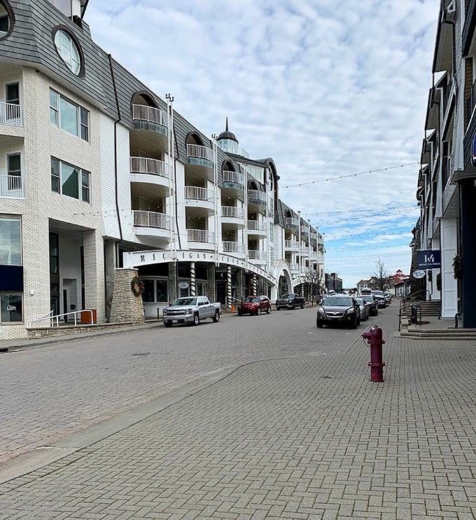 The crisp white facades of Bay Harbor's waterfront buildings offer a contemporary counterpoint to Petoskey's Victorian downtown.