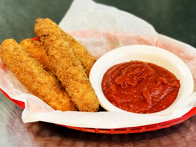 Mozzarella sticks: the universal language of "yes, we're definitely getting an appetizer" that never disappoints at The Backroom.