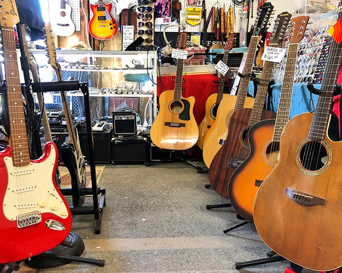 More guitars than a folk festival, each one begging you to finally learn those three chords you've been promising yourself.