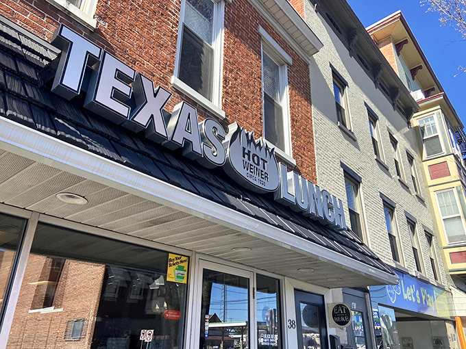 That sign isn't just advertising&mdash;it's a promise. Three words that have drawn hungry travelers off the highway for generations.