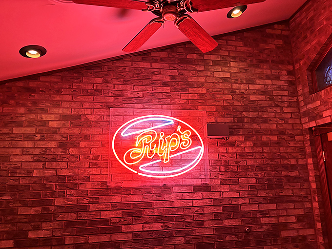 The neon Rip's sign glows against brick walls like a bat signal for the fried-chicken obsessed. Many have answered its call. 