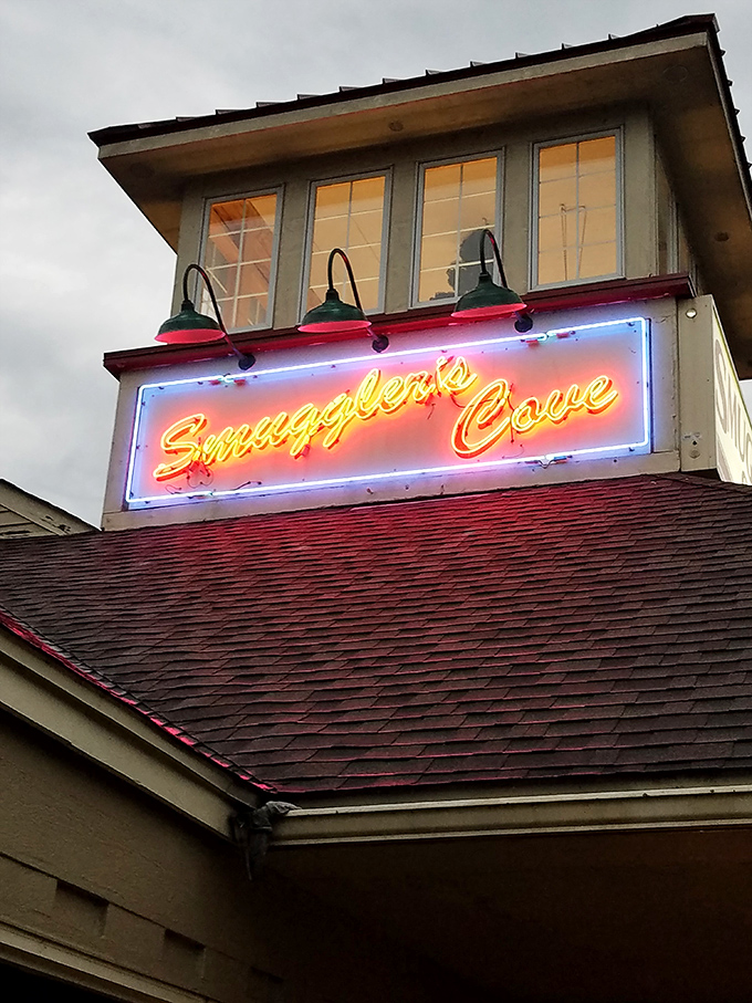 The neon sign glows like a lighthouse for hungry souls. When this illuminates against the evening sky, you know good things await inside.
