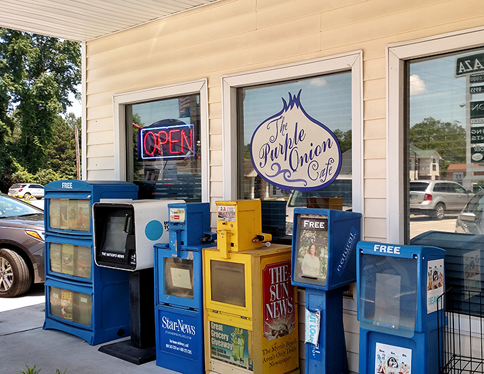 Old-school newspaper boxes outside remind us that some traditions, like reading the paper over breakfast, deserve to be preserved.