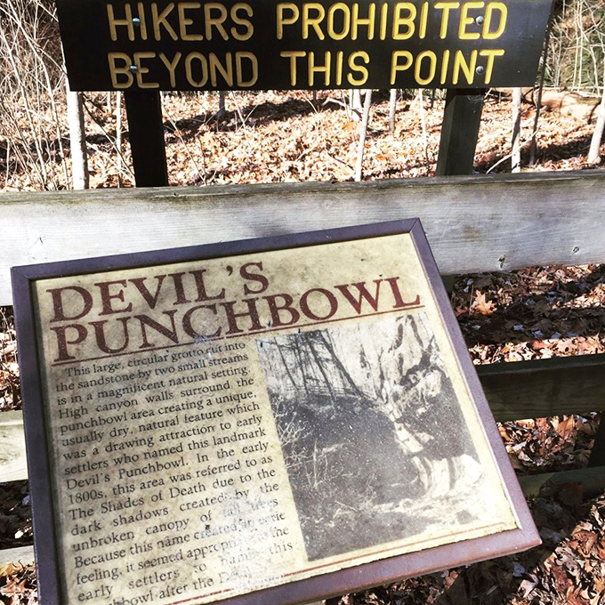 Devil's Punchbowl sign warns hikers away—not because it's dangerous, but because nature needs some personal space too.