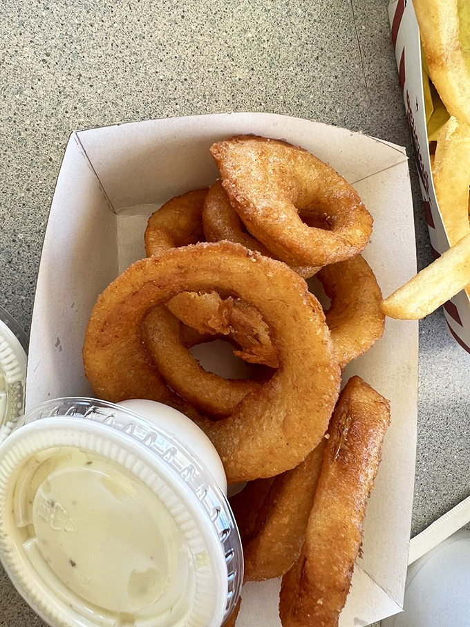 Onion rings with the perfect crunch-to-give ratio&mdash;where the humble onion transforms into golden hoops of happiness.