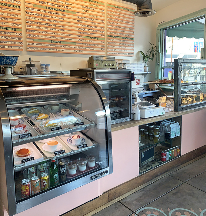 Behind the pink counter, a world of Cuban-inspired delights awaits, from guava pastries to pressed sandwiches that could change your day.