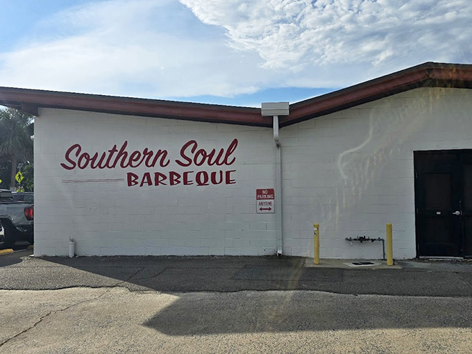 Simple white walls with that bold red logo&mdash;like a barbecue haiku that says everything it needs to with minimal fuss and maximum impact.