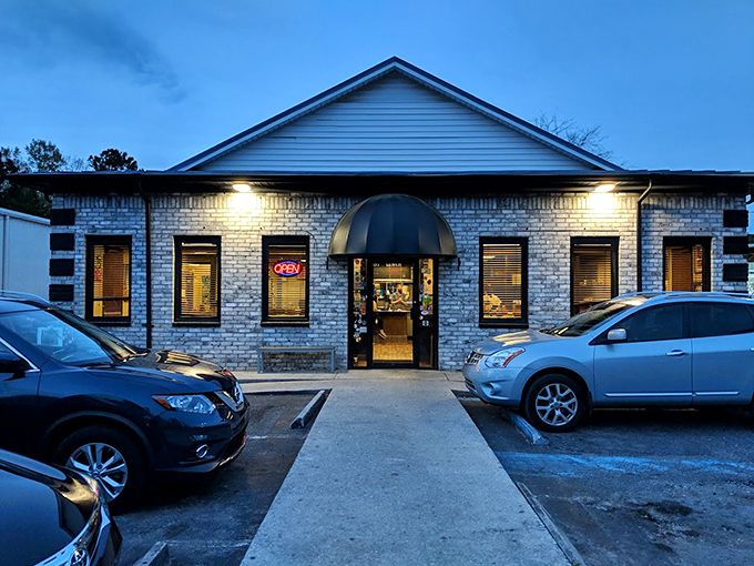 As evening falls, the Early Bird still welcomes hungry patrons. Some of life's best decisions happen after dark in diners like this.