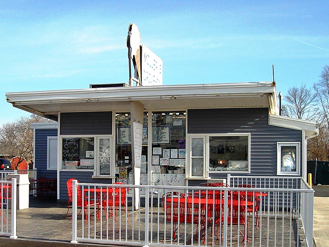 The outdoor seating area where memories are made between bites&mdash;red tables that have witnessed first dates, family celebrations, and countless "we should come here more often" promises.