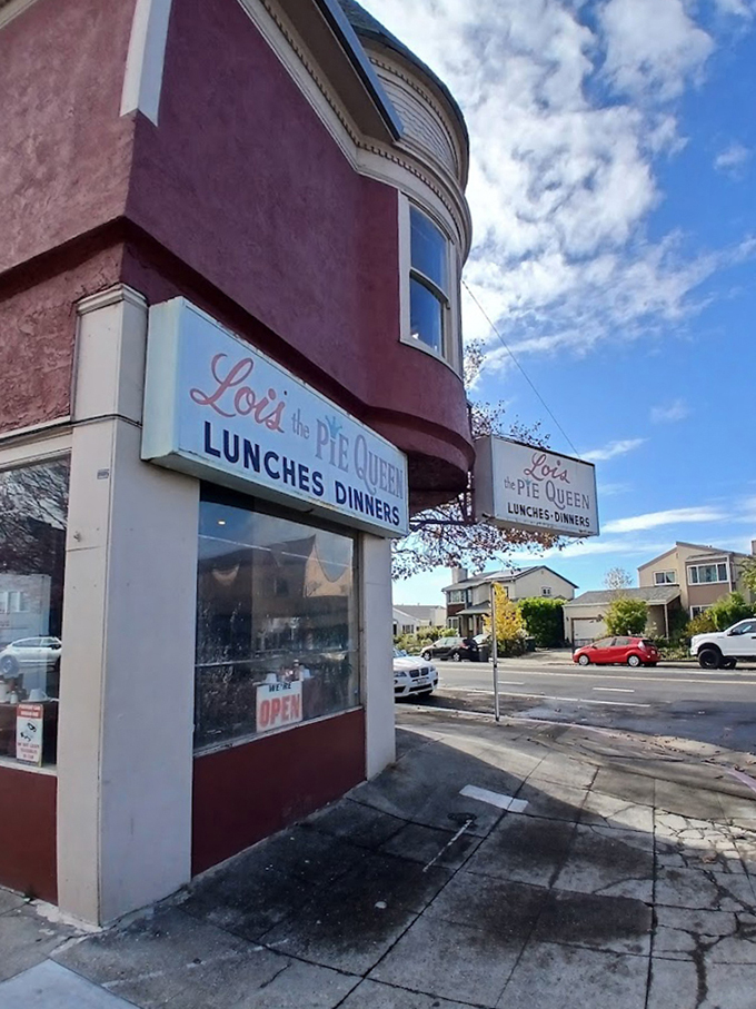 The corner spot that's witnessed decades of Oakland life &ndash; standing proud in its burgundy coat like a neighborhood guardian.
