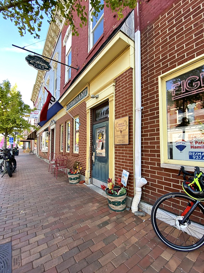 The storefront exudes small-town charm with its brick sidewalk and blue door &ndash; like something from a movie where the protagonist finds themselves again.