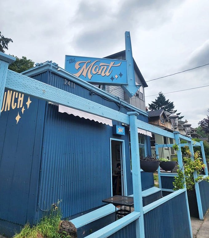 The Mont's exterior view reveals the care in every detail, from the retro signage to the welcoming blue-trimmed entrance that practically pulls you inside.