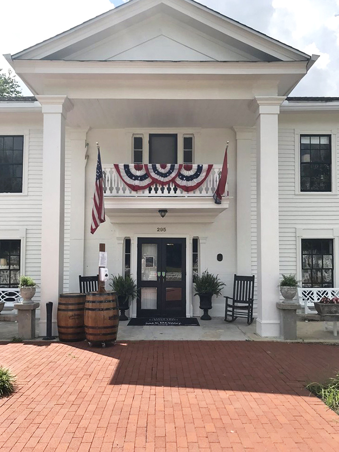 The entrance that's seen generations of hungry visitors. Those whiskey barrels aren't just decoration &ndash; they're a nod to Lynchburg's spirited heritage.