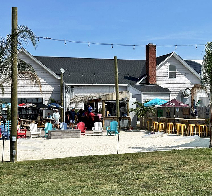 The outdoor area with its tiki bar and beach chairs creates an instant vacation vibe. Who needs the Caribbean when Maryland does this?