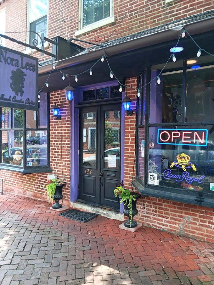 The entrance says "come as you are" but the blue lights whisper "prepare to be transported." New Castle brick outside, New Orleans soul inside.