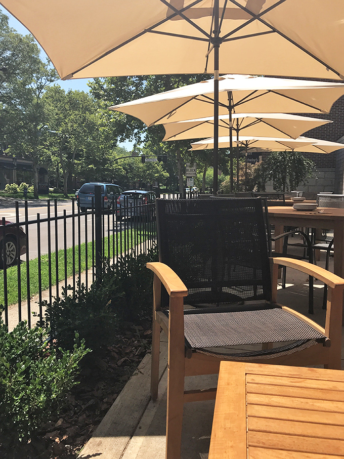 Outdoor seating that captures Ohio's fleeting summer days perfectly. Those umbrellas aren't just for shade&mdash;they're for extending precious patio season.