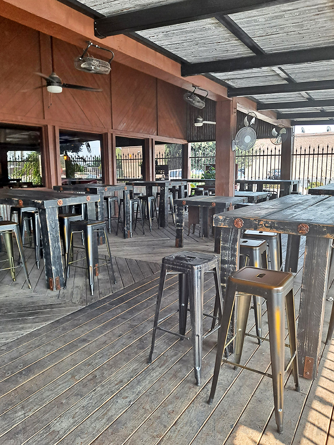 The outdoor seating area &ndash; where fresh air meets fresh food, and industrial-chic design creates the perfect backdrop for casual dining.