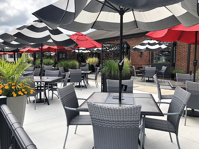 Outdoor dining under striped umbrellas&mdash;like a sophisticated beach club, minus the sand in your shoes and plus the incredible food on your table.