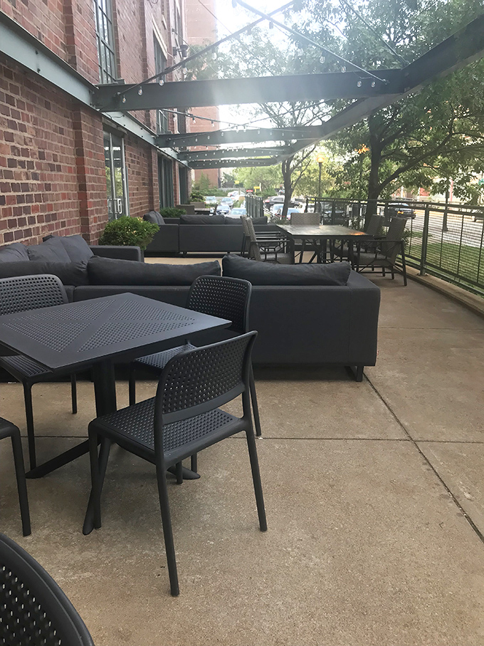The outdoor patio offers urban oasis vibes&mdash;comfortable seating under string lights where coffee conversations can stretch lazily into evening hours.